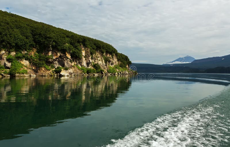 Beautiful Coast of Kurile Lake is Reflected in the Water. Stock Photo ...