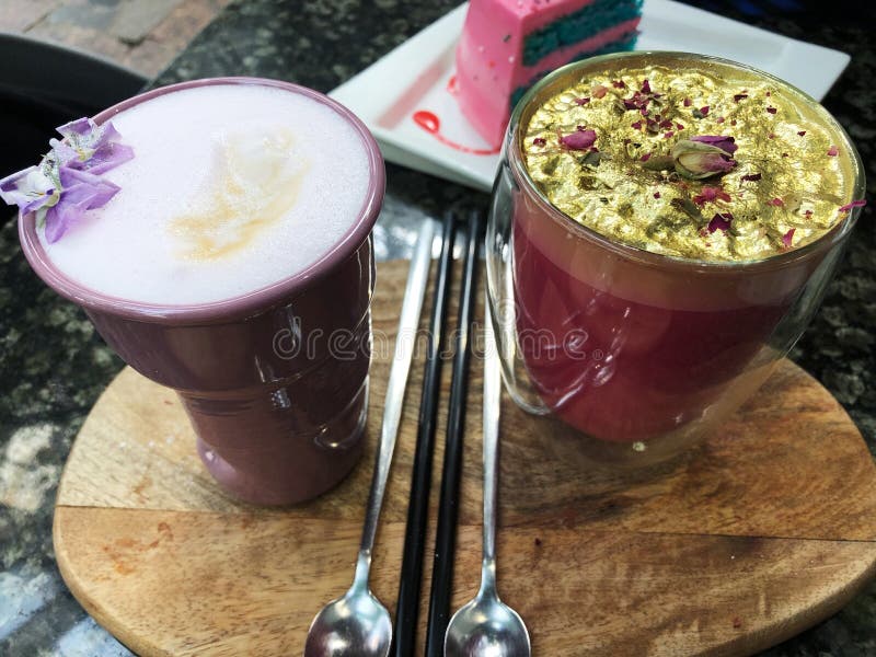 Beautiful Coffee with Violets and Roses in the Cafe Stock Image - Image ...