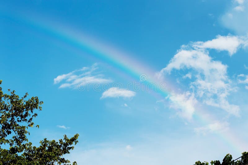 Beautiful Colorful Rainbow on Blue Sky Stock Photo - Image of beautiful ...