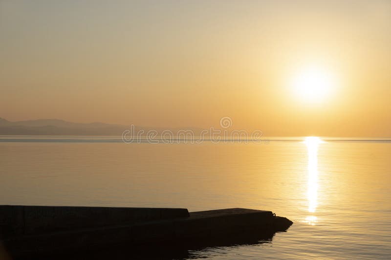 A Beautiful, Colorful Sunrise with a Sunny Path Over the Sea Stock ...