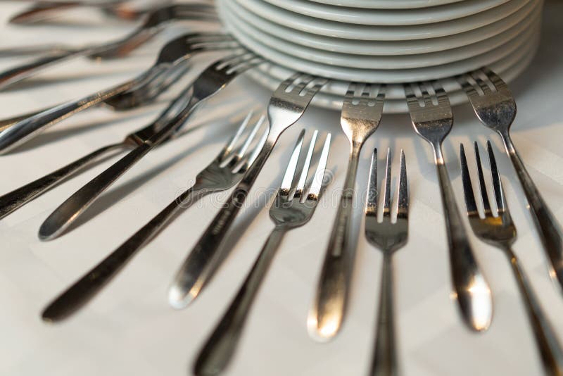 Beautiful Composition with Forks and Plates on a Buffet Table. Stock ...