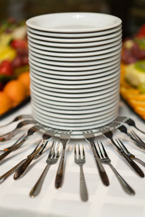 Beautiful Composition with Forks and Plates on a Buffet Table Stock ...