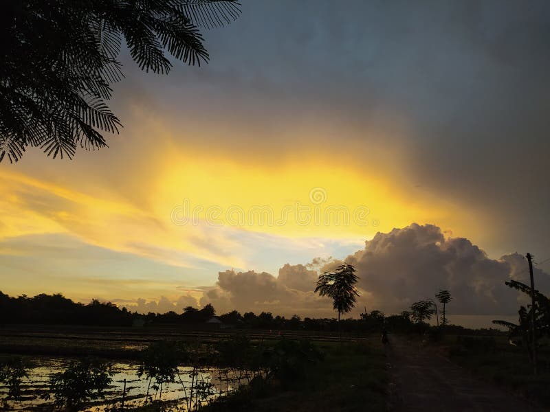 The Beautiful Composition of Sun, Clouds and Scenery. Stock Photo ...