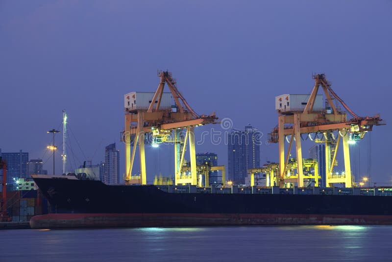 Beautiful of Container Ship in Port with Lighting and Dusky Sky Stock ...