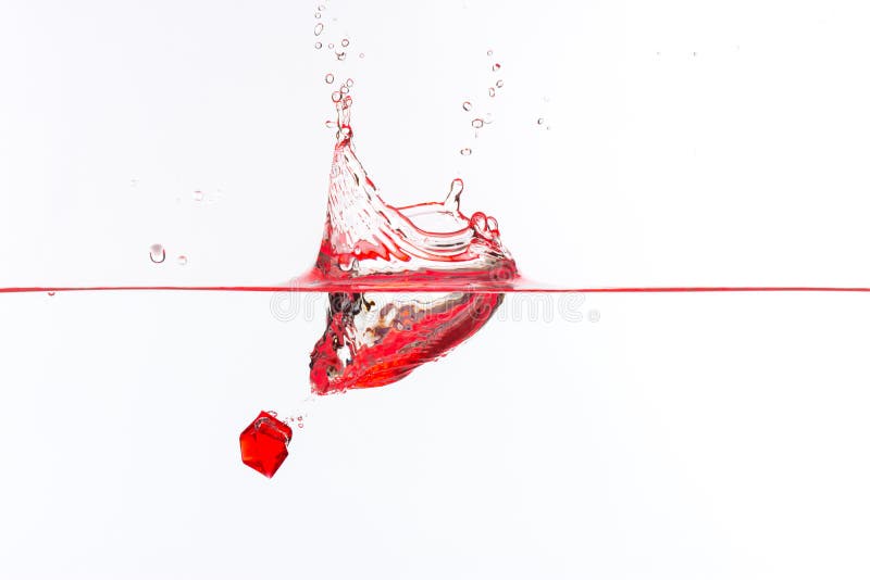 Beautiful and Cool Splashes of Water from Falling into it Red Tr Stock ...