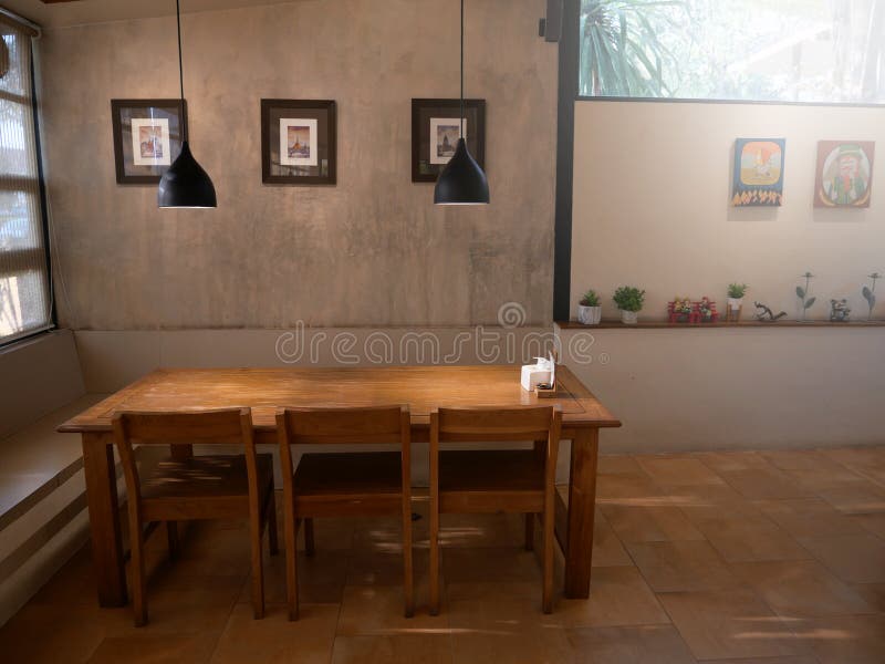 Corner Coffee Shop with Wood Table and Brown Leather Sofa Stock Photo ...