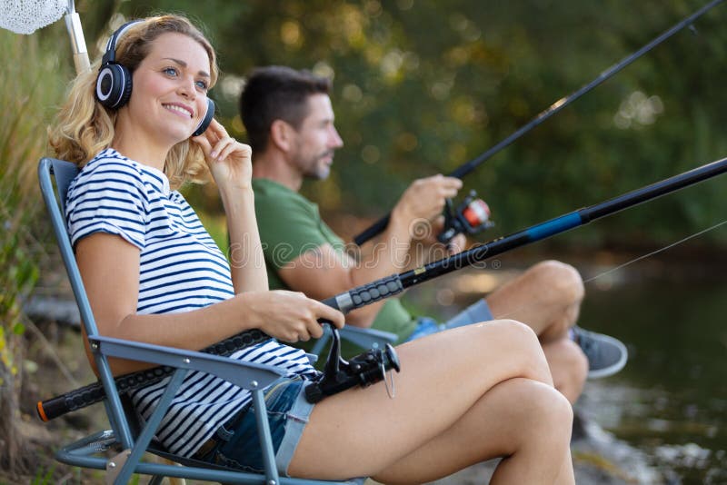 Beautiful Couple Catching Fish in Pond Stock Image - Image of husband ...