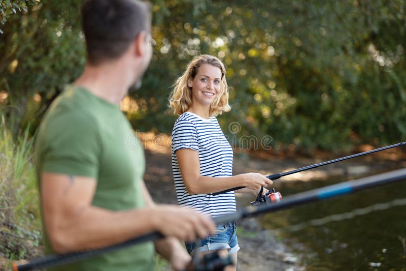 Beautiful Couple Catching Fish in Pond Stock Image - Image of hobby ...