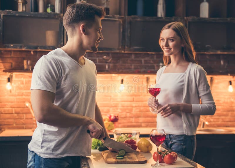 Beautiful couple cooking stock photo. Image of male, glass - 85108816