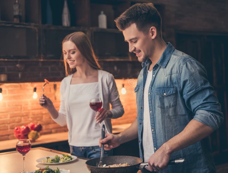 Beautiful couple cooking stock image. Image of caucasian - 85105969