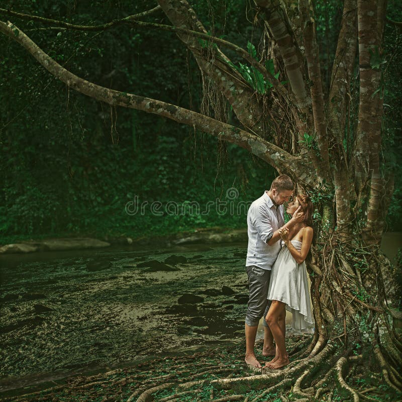Beautiful Couple in Dramatic Forest Stock Photo - Image of dark, night ...