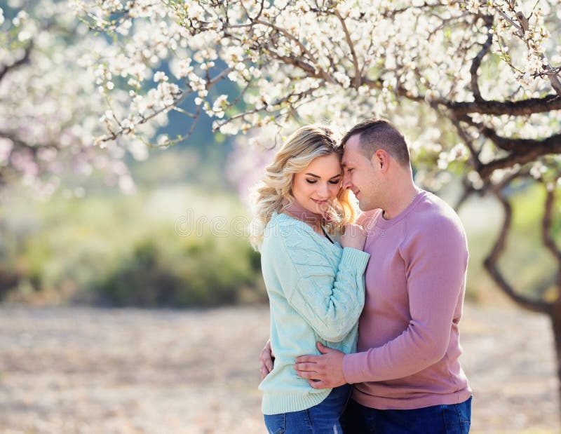 Beautiful Couple in the Flowering Gardens in the Spring Stock Image ...