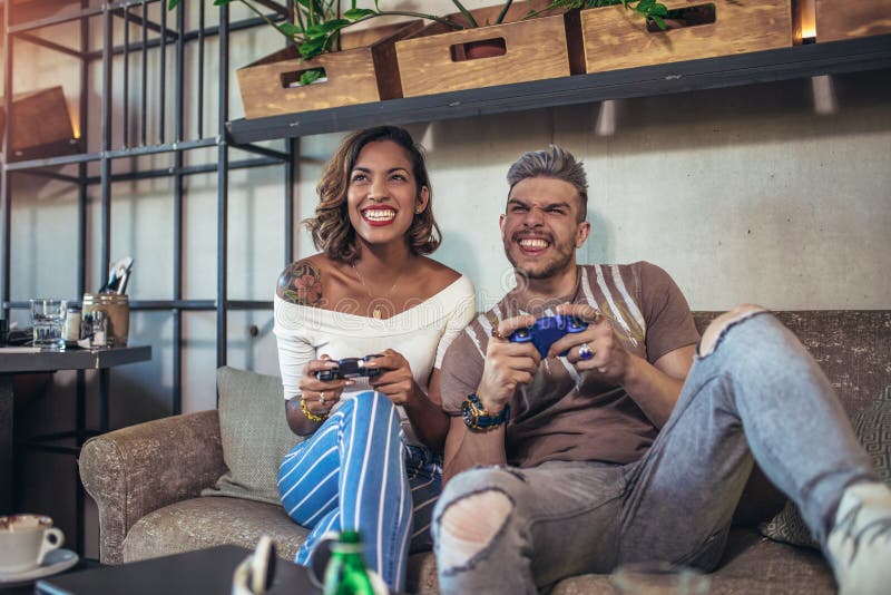 Couple Having Fun while Playing Video Games. Stock Image - Image of ...