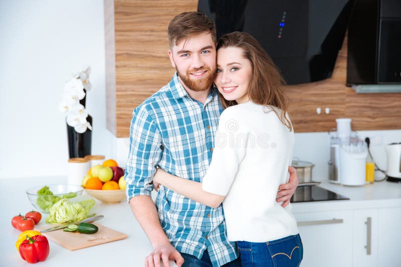 Beautiful Couple Hugging on the Kitchen Stock Image - Image of cooking ...