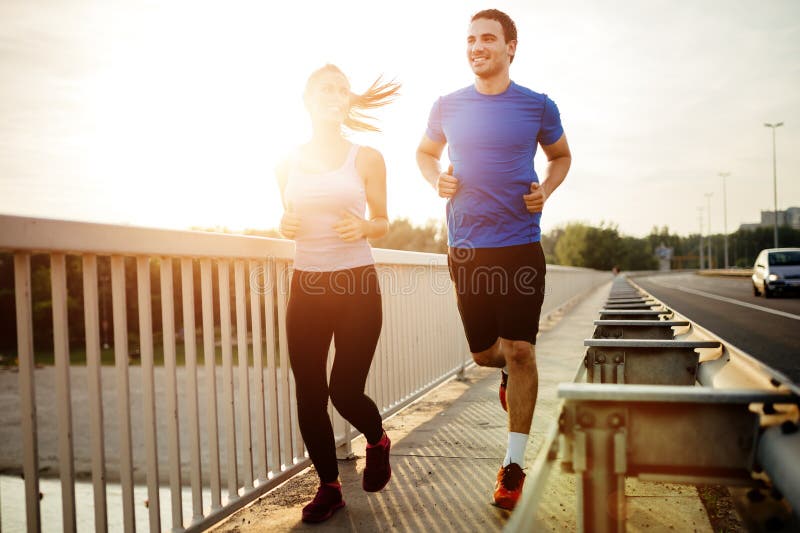 Beautiful couple in motion stock photo. Image of athletic - 73323624