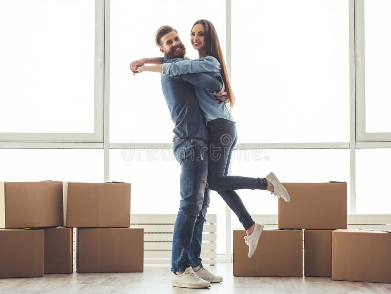 Beautiful couple moving stock photo. Image of home, happy - 85642392