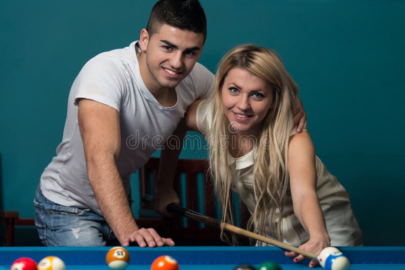 Beautiful Couple Playing Pool Stock Photo - Image of couple, clubbing ...