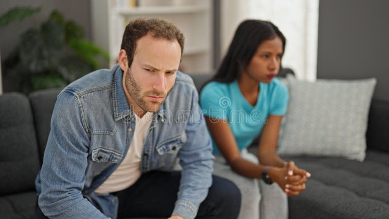 Beautiful Couple Couple Sitting on Sofa with Angry Face at Home Stock ...