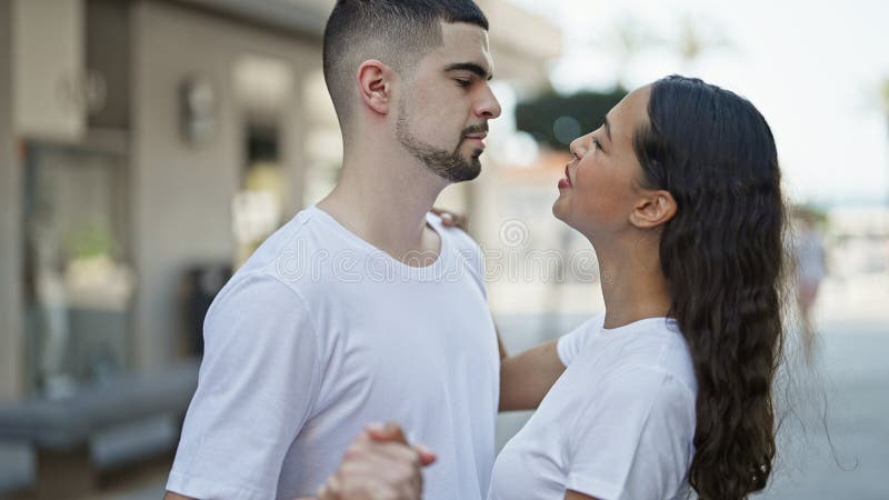 Beautiful Couple Smiling Confident Dancing at Street Stock Photo ...
