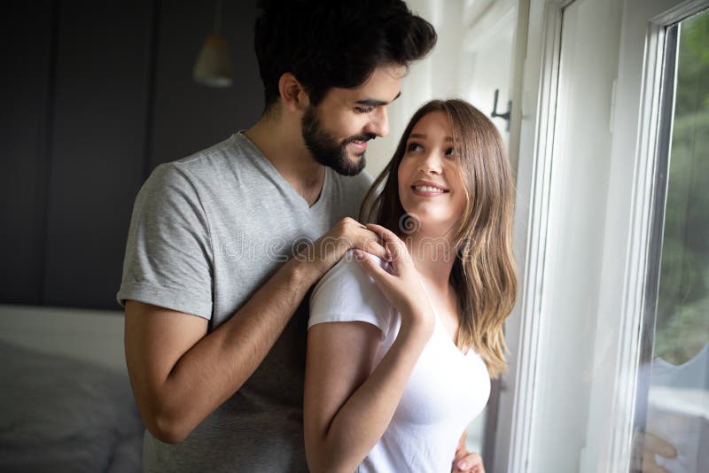 Beautiful Couple is Smiling and Hugging while Spending Time Together in ...