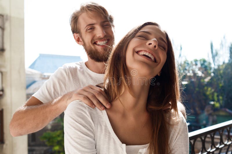 Beautiful Couple Standing At Balcony Man Making Massage His Girlfriend