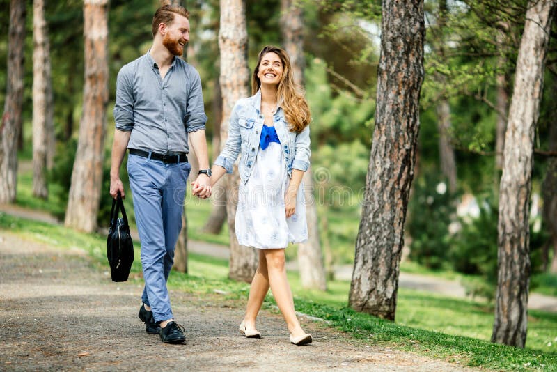 Beautiful Couple Taking a Walk in City Park Stock Image - Image of ...