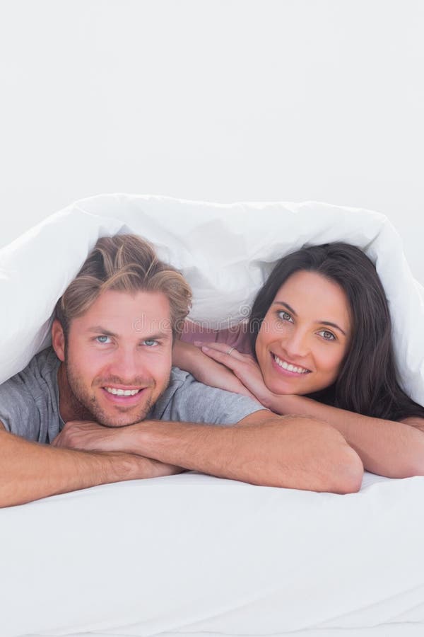 Beautiful Couple Under the Cover Stock Image - Image of household ...
