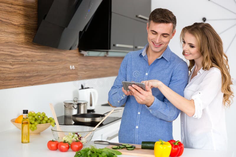 Happy Couple Cooking Healthy Food Together Stock Image - Image of ...