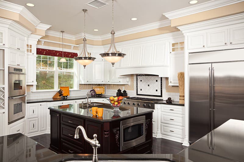 Kitchen Interior with Stone Accents in Affluent Ho Stock Photo - Image ...