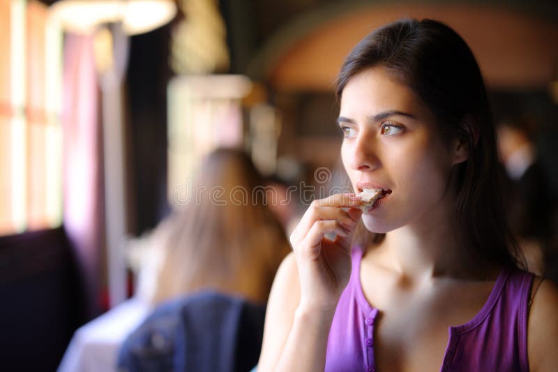 Beautiful Customer Eating Bread in a Restaurant Stock Photo - Image of ...