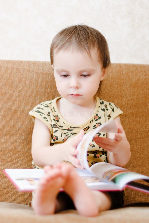 Beautiful Cute Baby Reading a Book Stock Photo - Image of cheerful ...