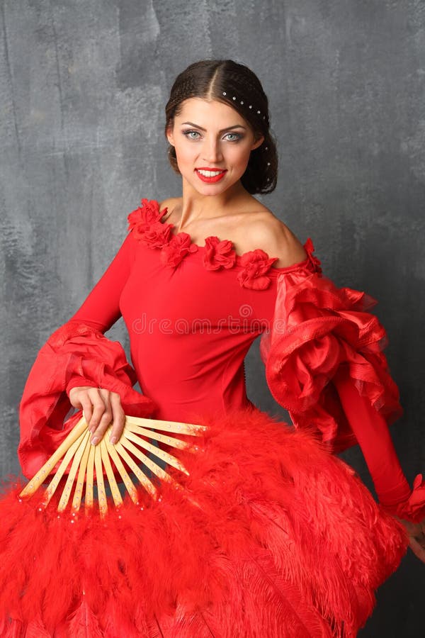 Beautiful Dancer in a Red Dress with a Red Fan in Stock Photo - Image ...