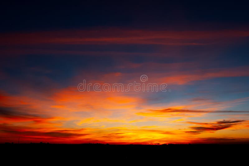 Beautiful Dark Landscape of Vivid Sunset and Clouds. Stock Photo ...