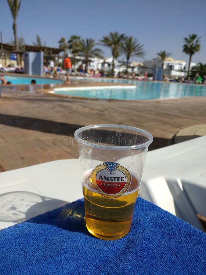 Relaxing at the poolside editorial stock image. Image of lanzarote ...