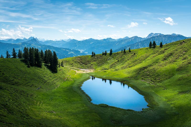Beautiful Daytime View of a Mountainous Landscape with a Lake Stock ...