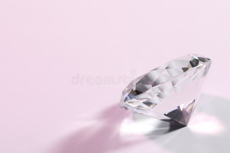 Beautiful Dazzling Diamond on Pink Background, Closeup. Space for Text ...
