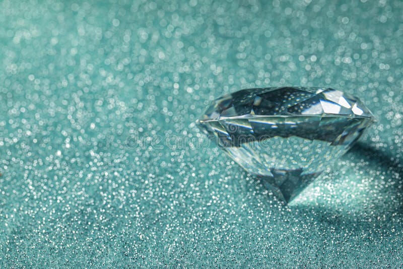 Beautiful Dazzling Diamond on Shiny Glitter Background, Closeup. Space ...