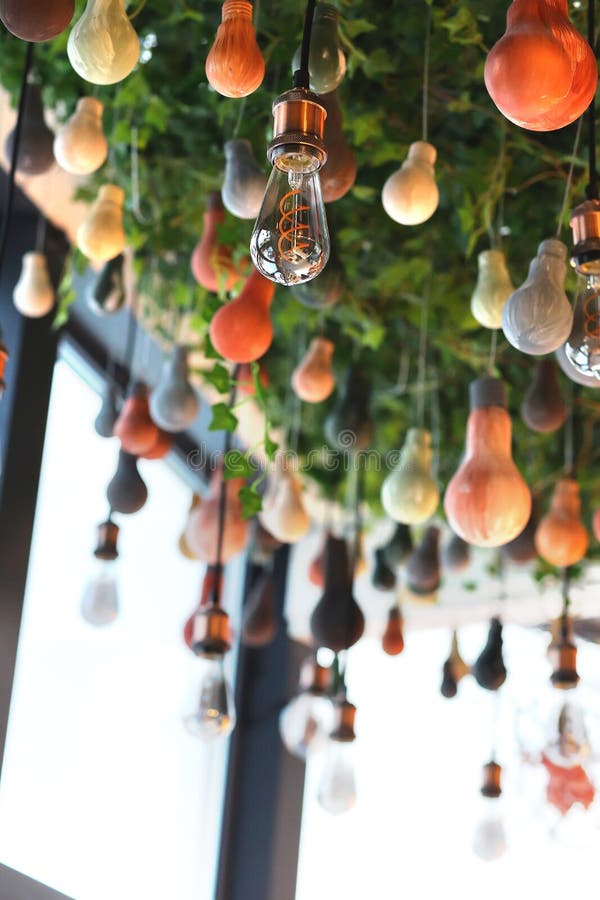 A Beautiful Decorative Tree is Decorated with Many Light Bulbs ...