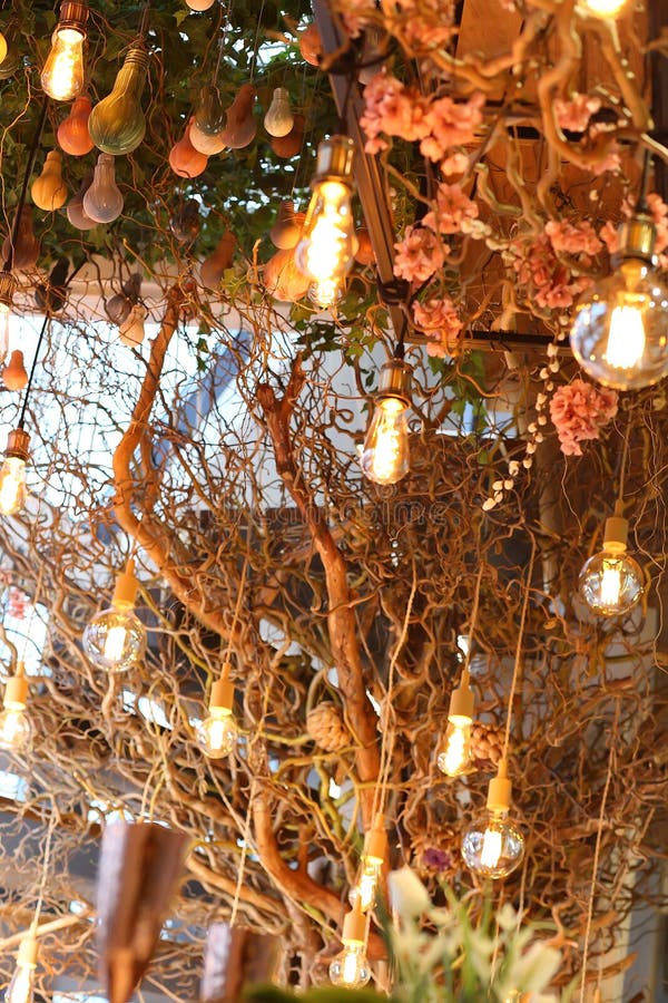 A Beautiful Decorative Tree is Decorated with Many Light Bulbs ...