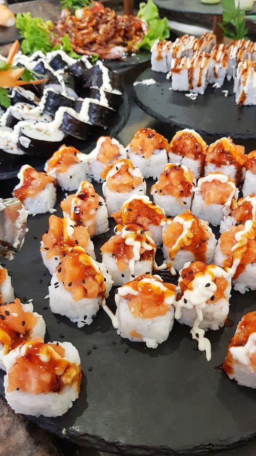 Beautiful sushi buffet stock image. Image of oriental - 117812935