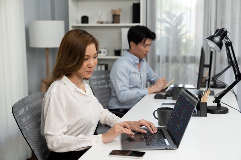 Beautiful it Developer Analyzing Program Application beside Coworker. Infobahn. Stock Photo ...