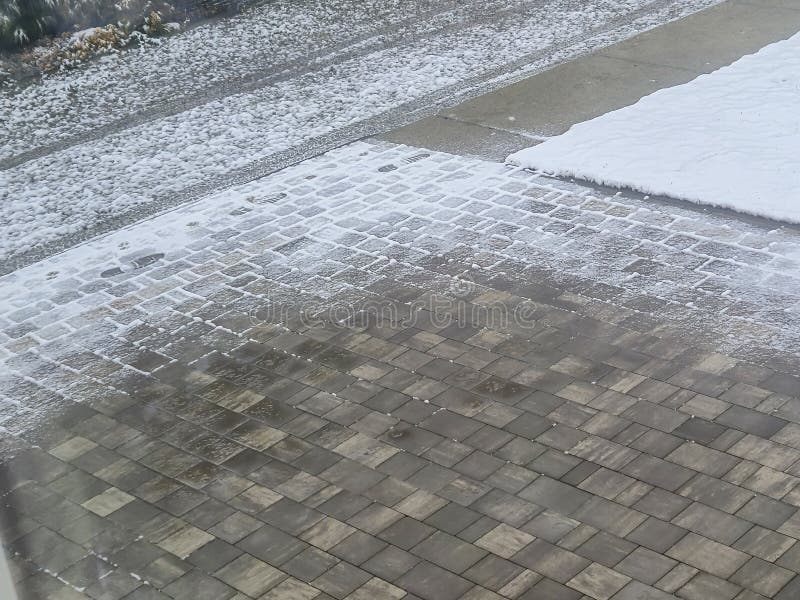 A Beautiful Display of a Snow-covered Stone Pavement, Showcasing Unique ...