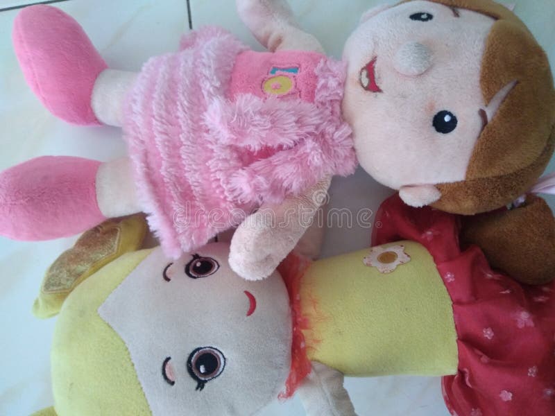 Beautiful Dolls Lying Side by Side Stock Image - Image of figurine ...