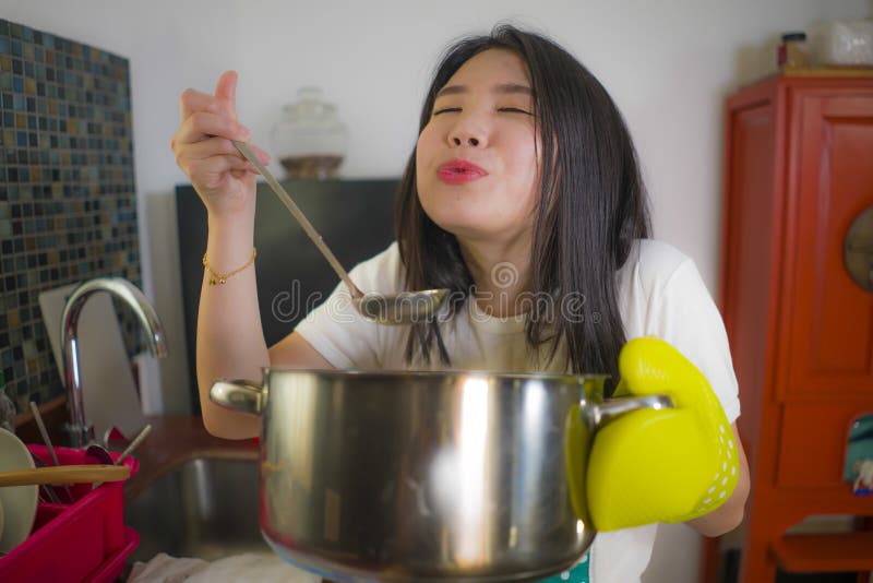 Lifestyle Portrait Of Young Pretty And Happy Asian Chinese Woman In