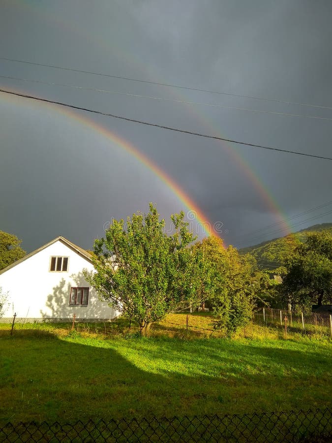 Beautiful Double Rainbow Against a Dark Sky Stock Photo - Image of rain ... Beautiful Double Rainbow Against a Dark Sky Stock Photo - Image of rain ...