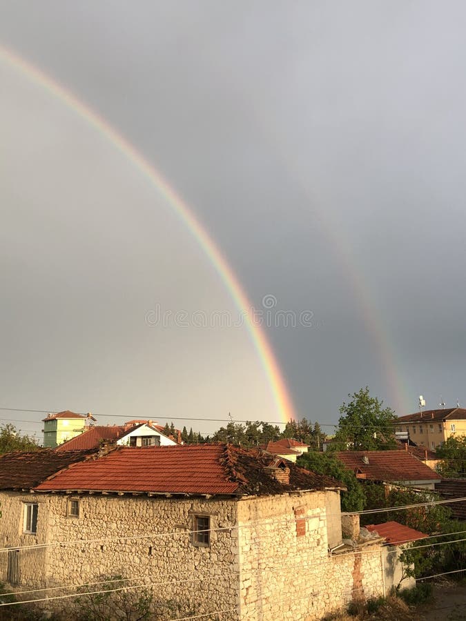 Beautiful Double Rainbow after the Rain in a Village Stock Image ...