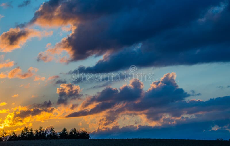 Dramatic sunset sky stock photo. Image of horizon, blue - 215446728