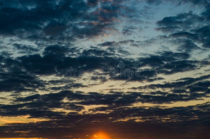 Dramatic sunset sky stock photo. Image of sunset, orange - 194610324