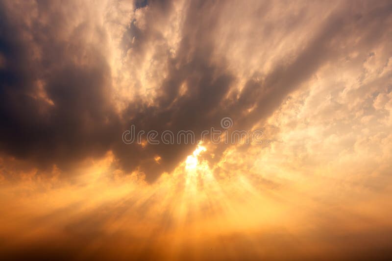 Dramatic Golden Sky with Sunbeam and Light Rays in the Sunset Stock ...