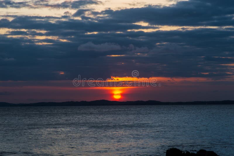 Beautiful Dramatic and Impressive Sunset with Dark and Dense Clouds ...